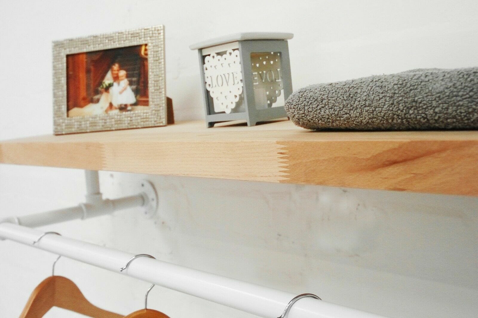 Wooden shelf with hanging rail store